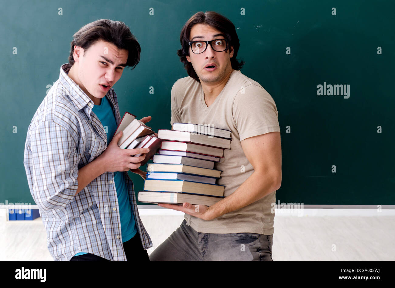 The two male students in the classroom Stock Photo - Alamy