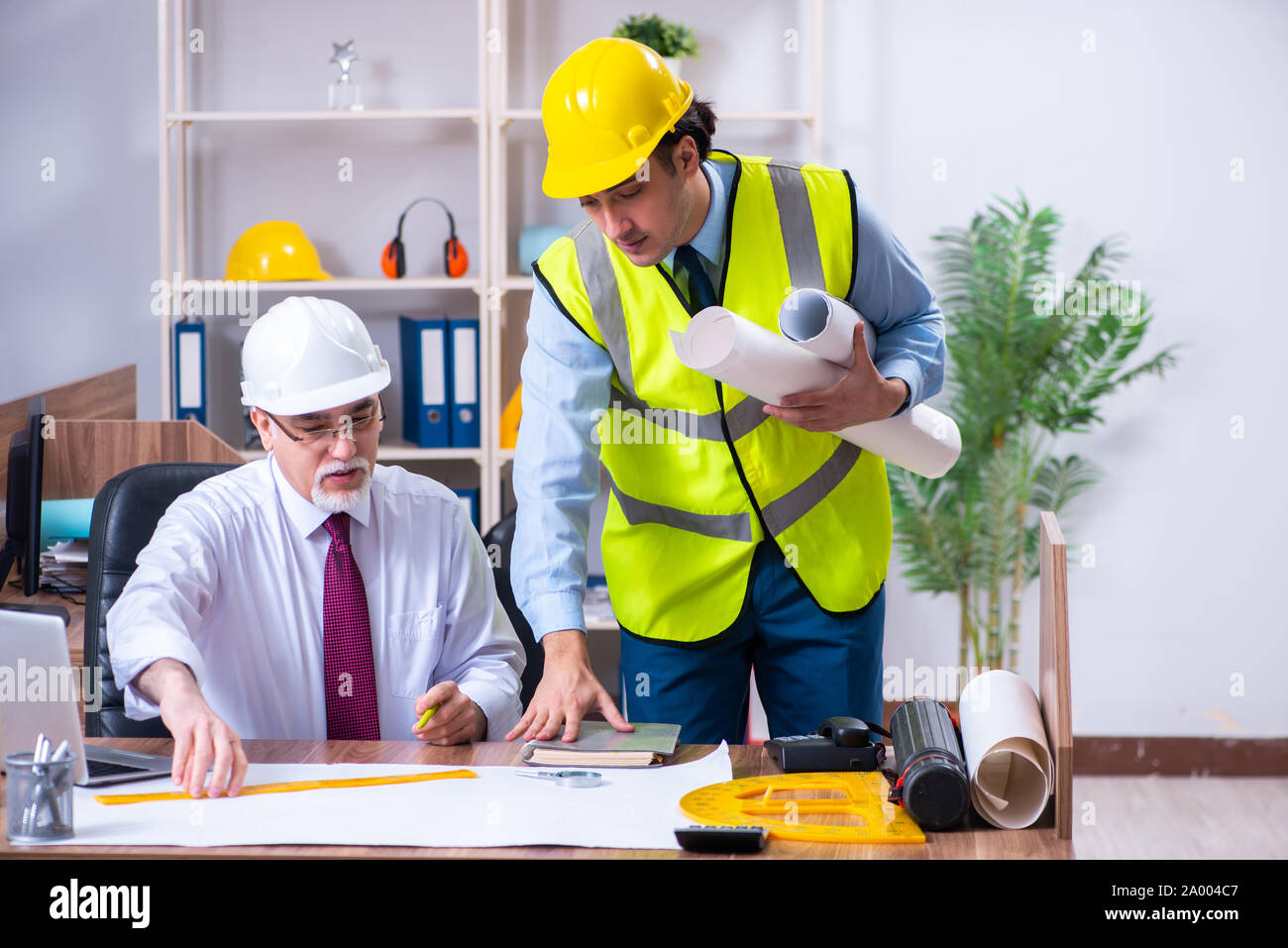 The two architects working on the project Stock Photo - Alamy