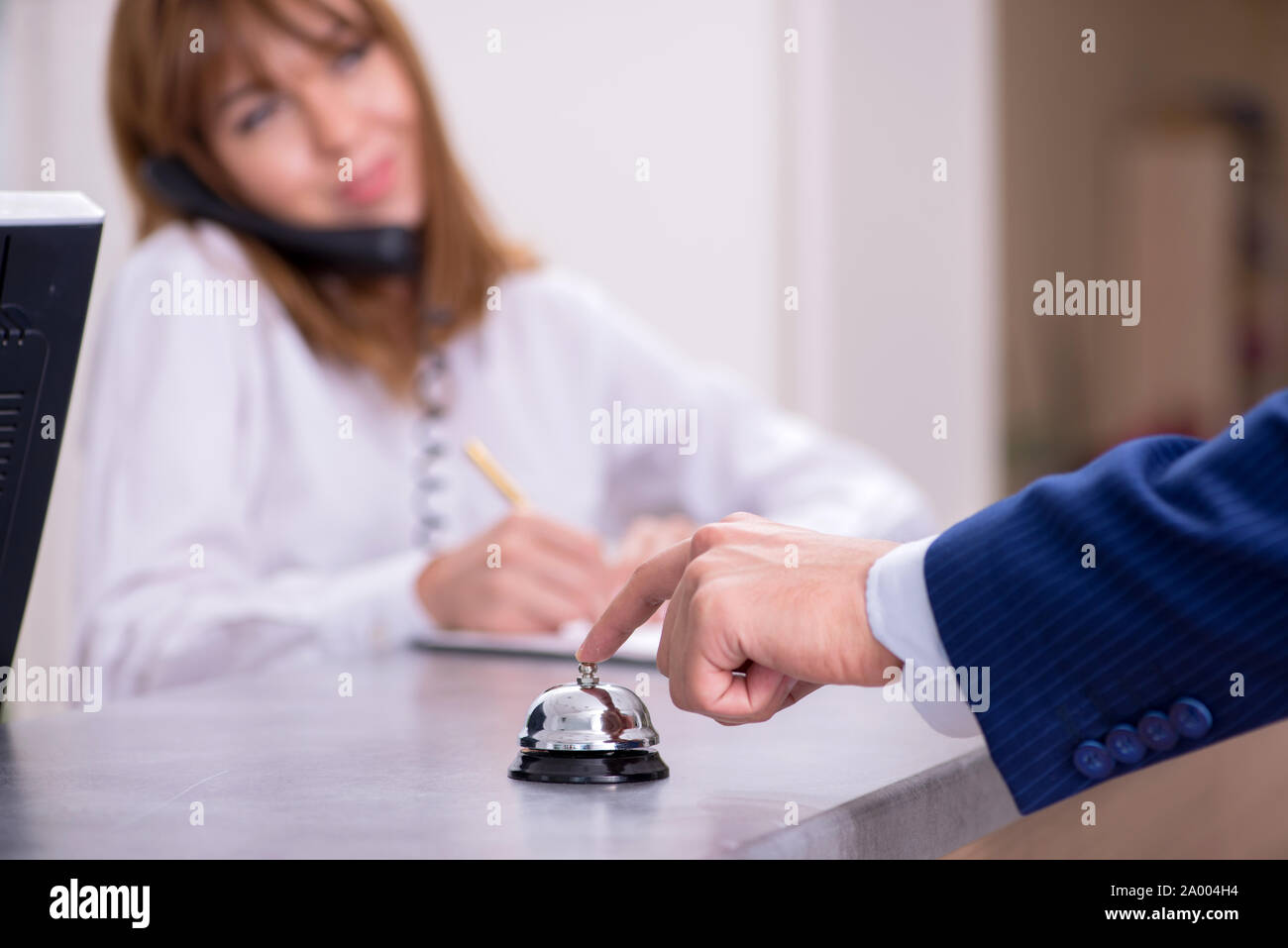 Hotel desk angry hi-res stock photography and images - Alamy