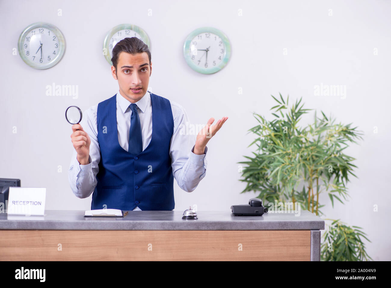 Office work funny young magnifying hi-res stock photography and images ...