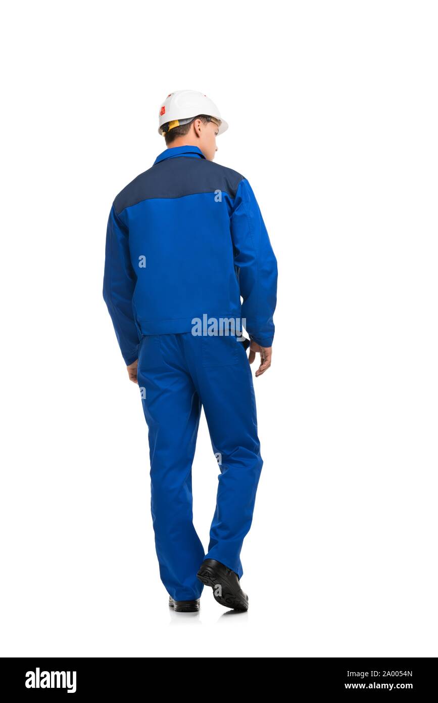 Man in blue work clothes and helmet isolated view Stock Photo - Alamy