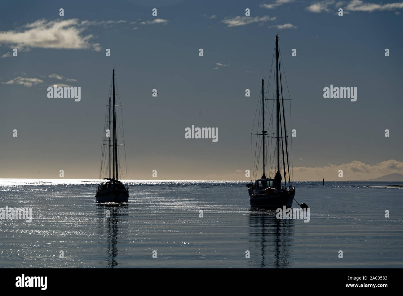 Boats on calm seas hi-res stock photography and images - Alamy