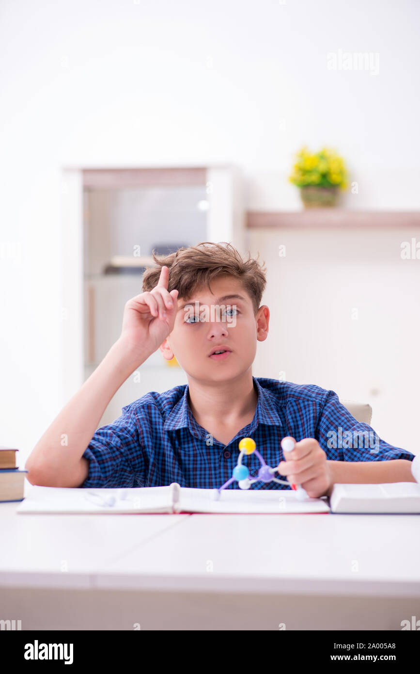 The kid preparing for school at home Stock Photo - Alamy