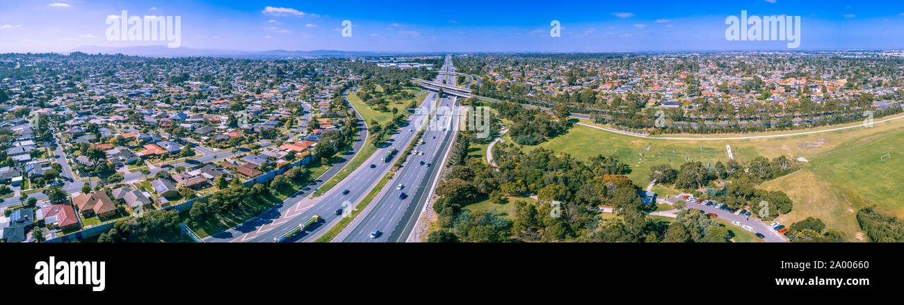 Wide aerial panorama of Monash Freeway passing through Wheelers hill ...