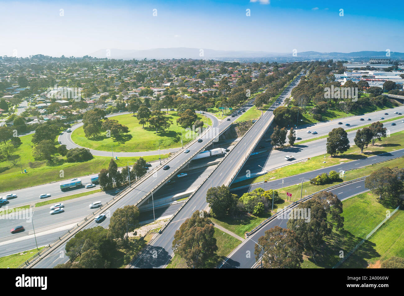 Highway interchange in bright sunlight with harsh shadows in Melbourne ...