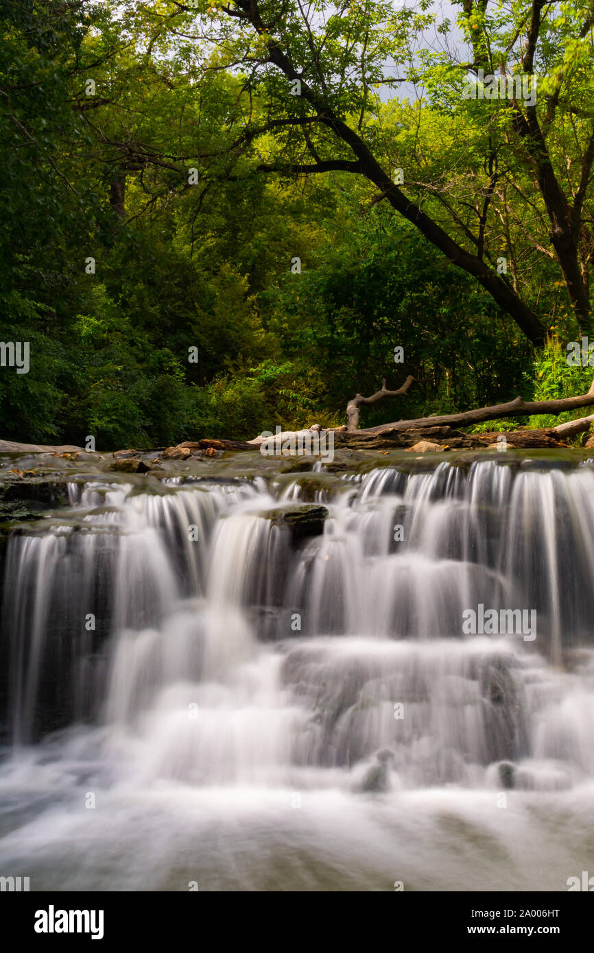 Water flowing down the cascade in Waterfall Glen Forest Preserve ...