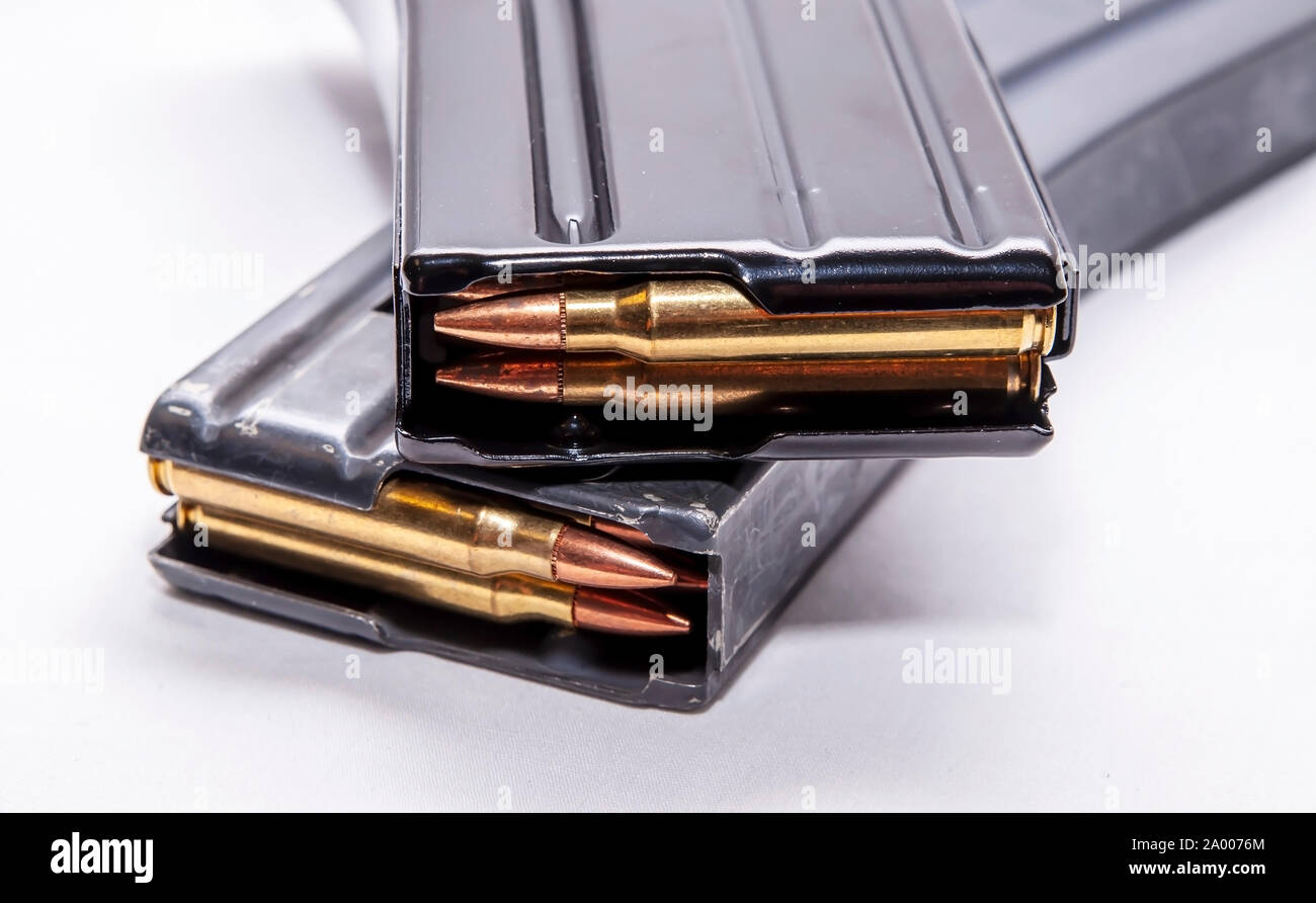 Two loaded 223 caliber rifle magazines on a white background Stock ...