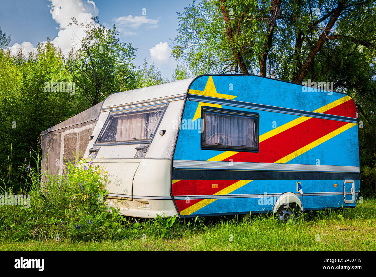 A car trailer, a motor home, painted in the national flag of Democratic ...