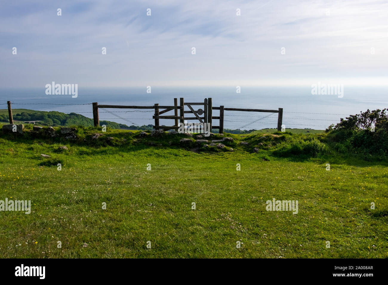 Gate wooden field grass sea hi-res stock photography and images - Alamy