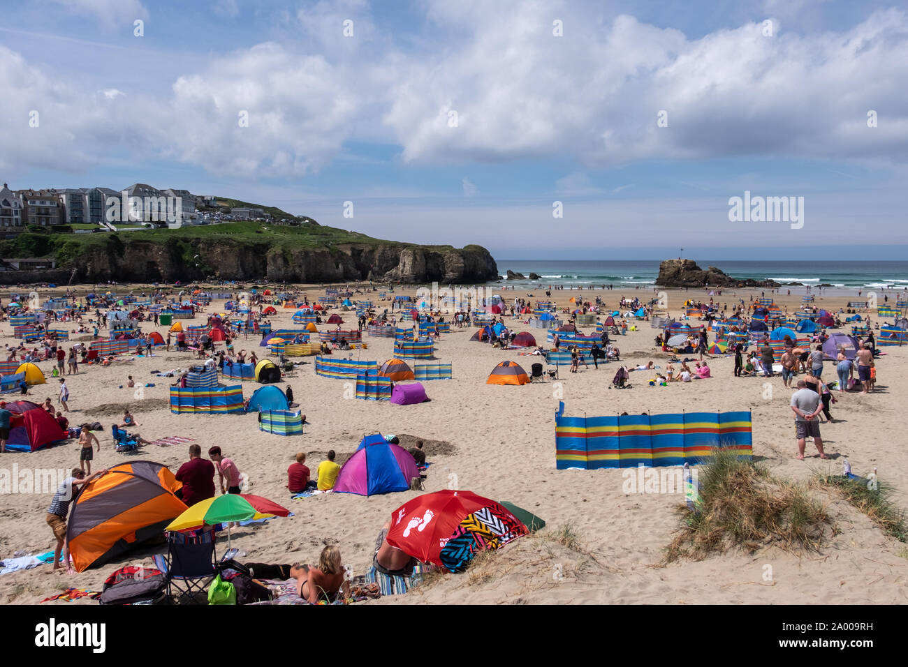 Colourful tents and windbreakers on Perranporth Beach Stock Photo - Alamy