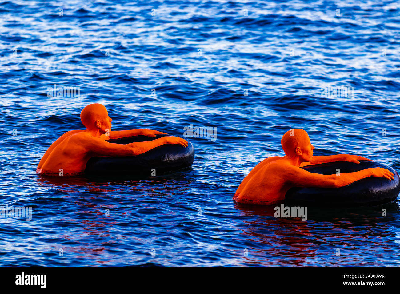 Ann Hirsch and Jeremy Angier's “SOS (Safety Orange Swimmers),” art ...