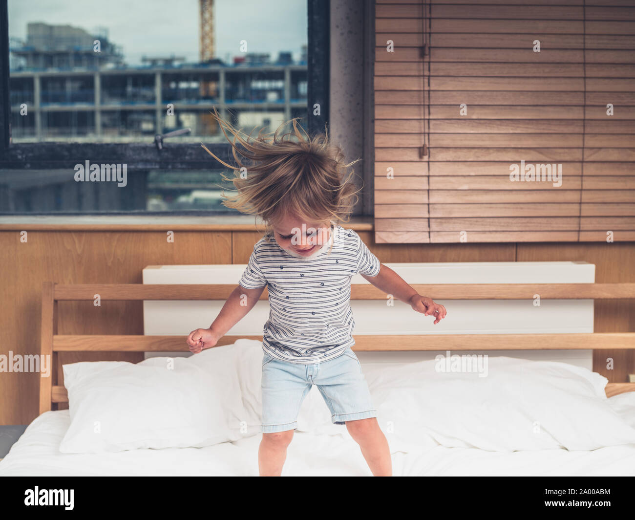 Toddler Jumping On Bed High Resolution Stock Photography and Images - Alamy