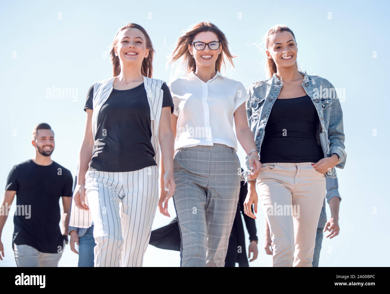 group of young people, confidently stepping forward Stock Photo - Alamy