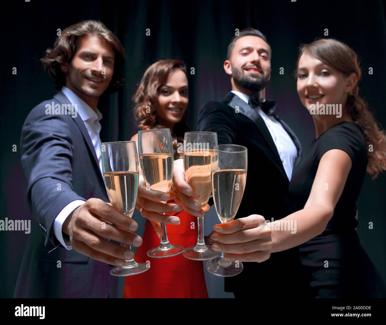 Cheerful people celebrating a sucess with Champagne Stock Photo - Alamy