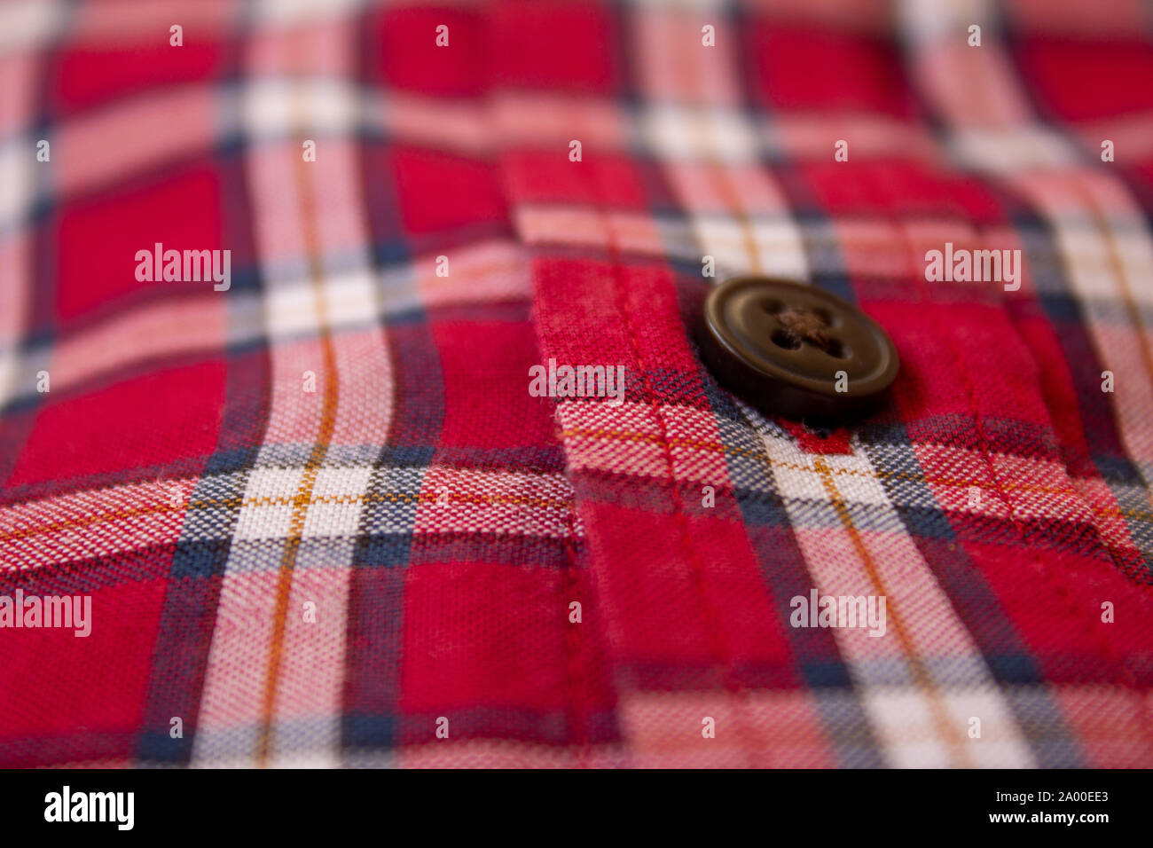 Red buttoned top hi-res stock photography and images - Alamy