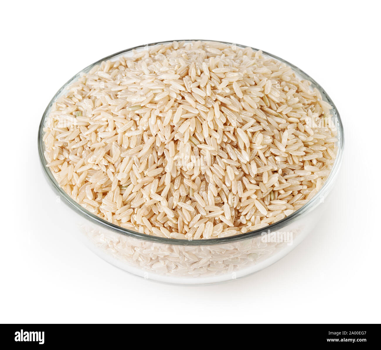 Brown rice in glass bowl isolated on white background with clipping ...