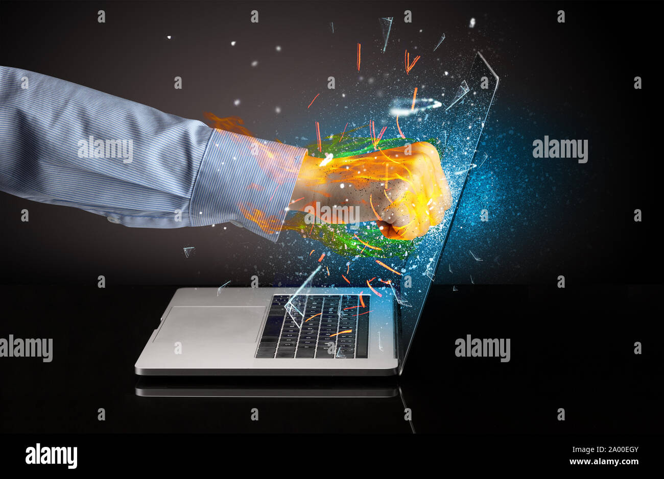 Firing hand hitting strongly laptop screen glass Stock Photo - Alamy