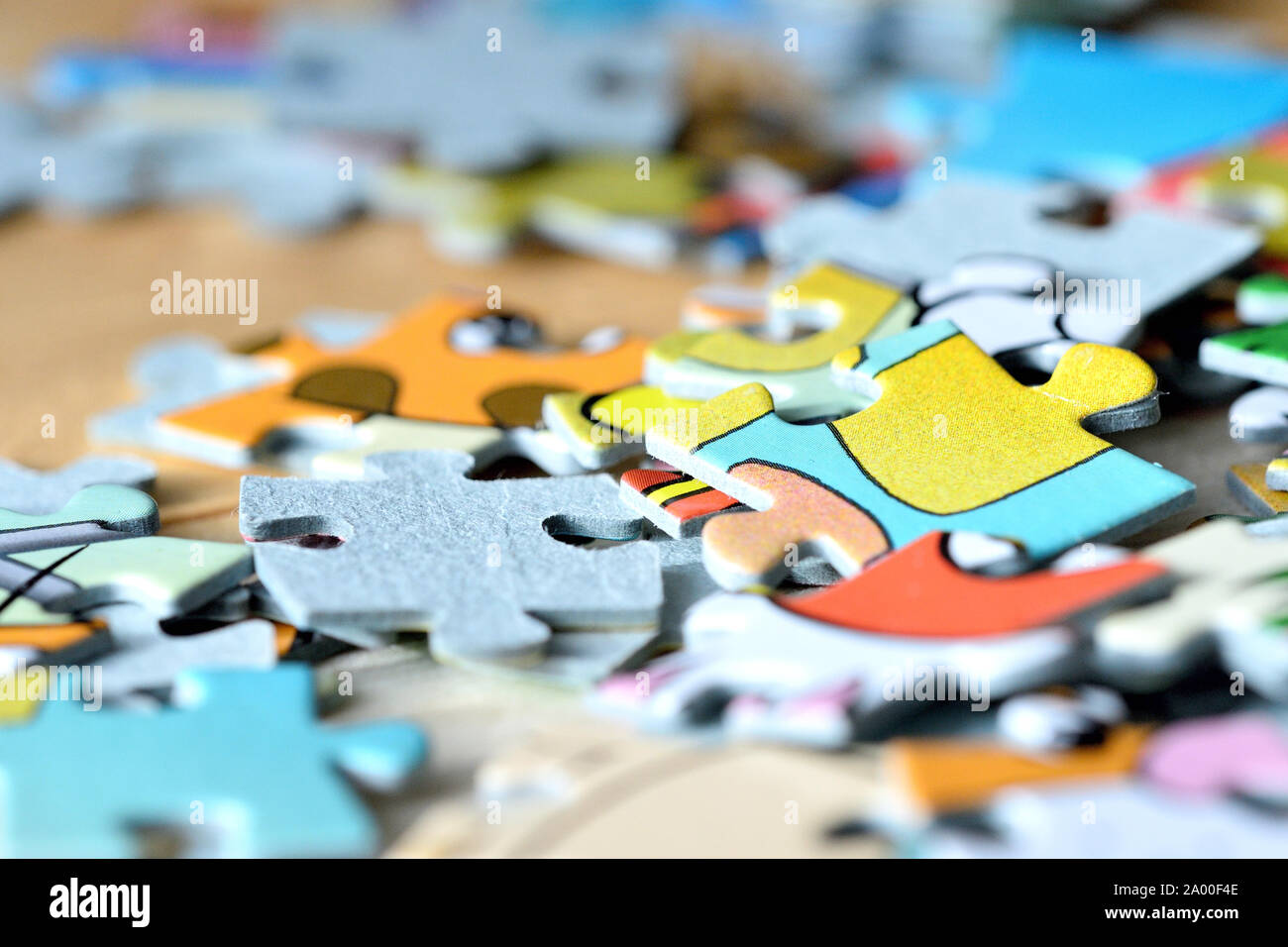 Children playing together jigsaw puzzle hi-res stock photography and ...