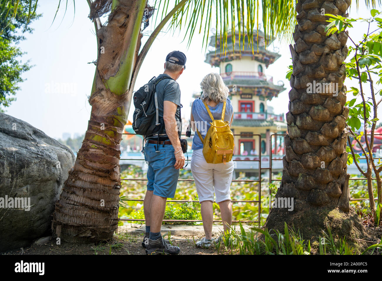 Kaohsiung, Taiwan: Elderly western Tourists photographing a chinese ...