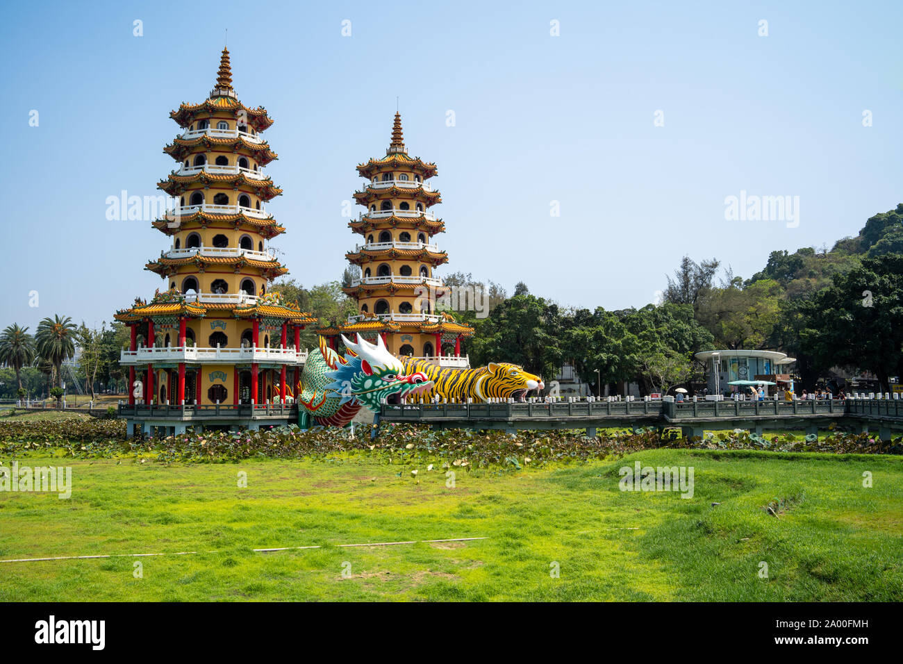 Kaohsiung, Taiwan: Tiger and Dragon Pagodas with green grass and Lotus ...