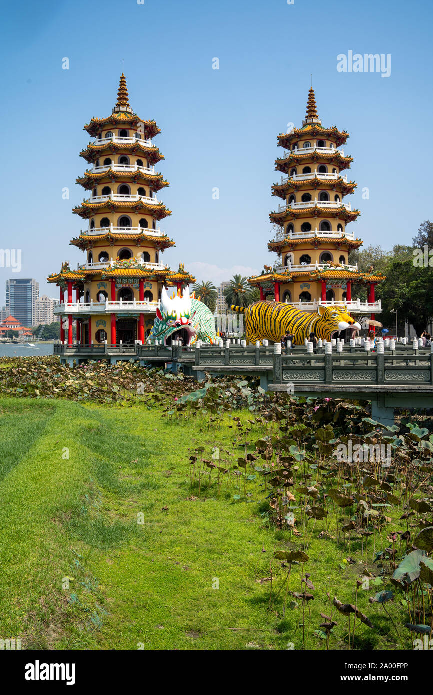 Kaohsiung, Taiwan: Tiger and Dragon Pagodas with green grass and Lotus ...