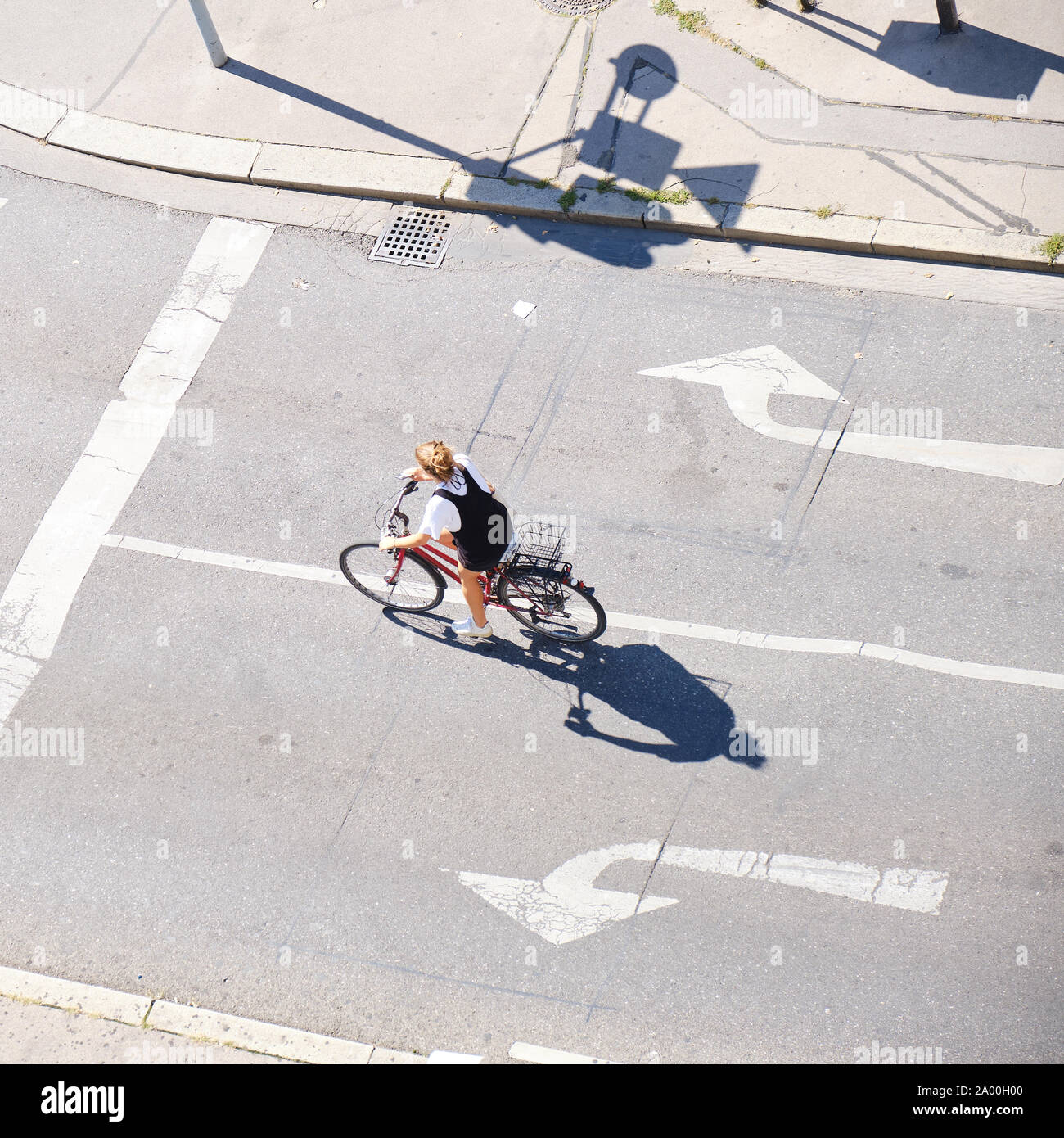 Vienna, Austria - September 13, 2019: Woman on a bicycle, between left ...