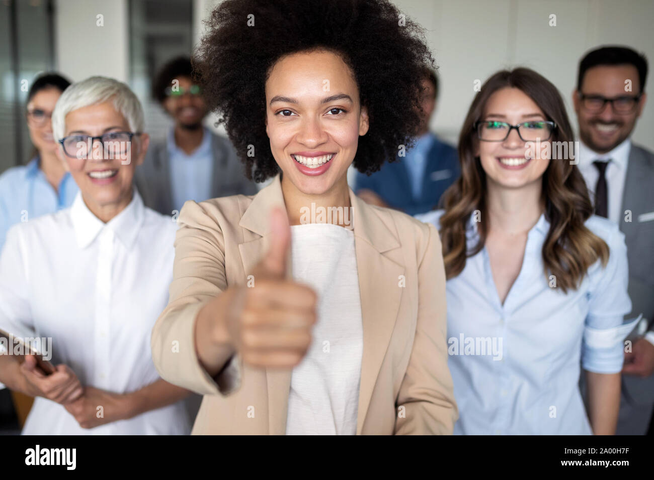 Business team celebrating a good job in the office Stock Photo - Alamy