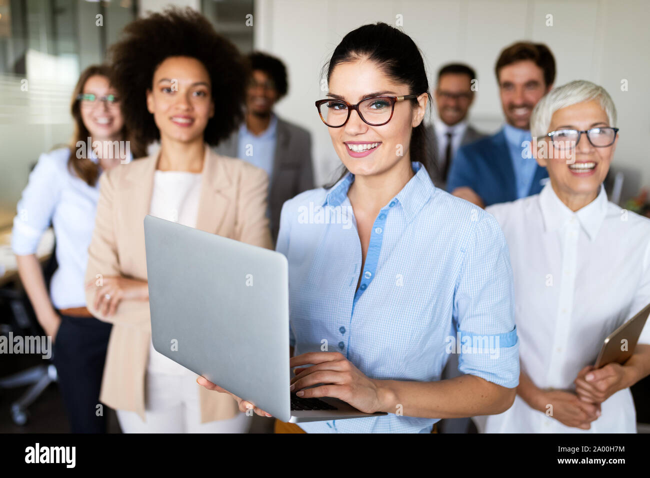 Successful business group of people at work in office Stock Photo - Alamy