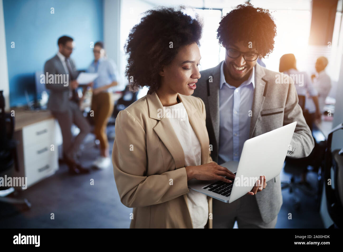 Programmer working in a software developing company office Stock Photo - Alamy