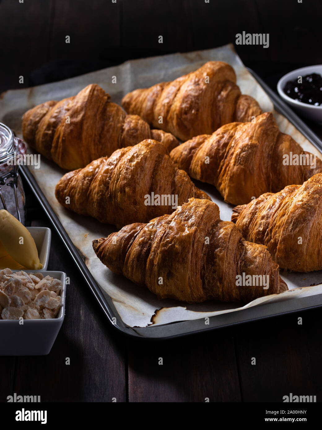 Tray of golden brown croissant Stock Photo - Alamy
