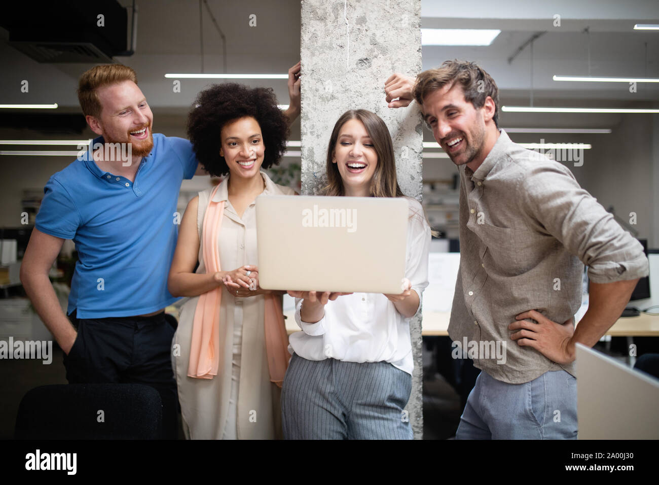 Programmer working in a software developing company office Stock Photo ...