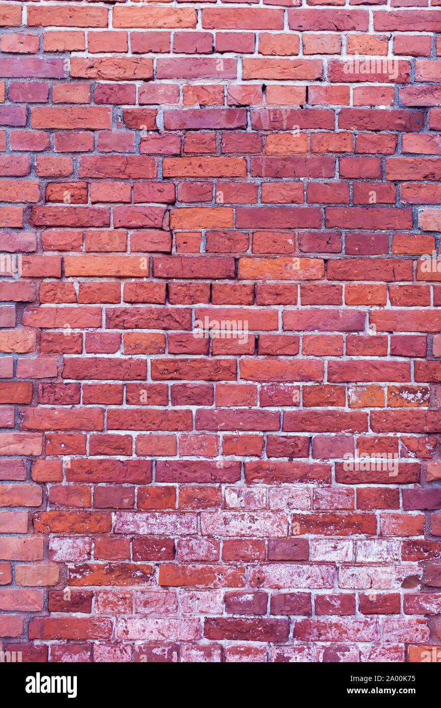 Vertical red bricks background. A part of wall of the building Stock ...