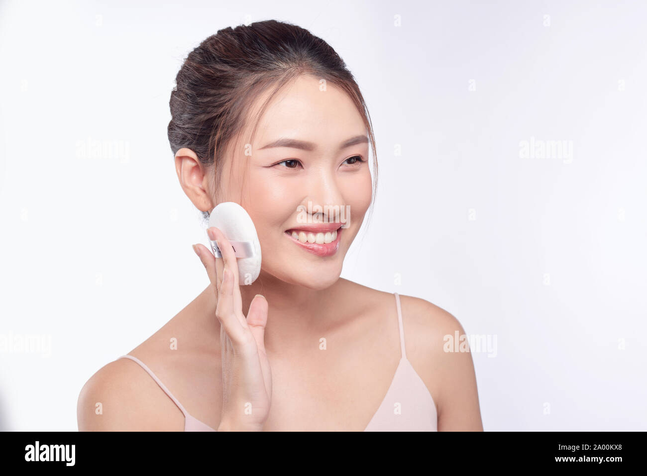 face of beauty young woman applying sponge - isolated on white Stock ...