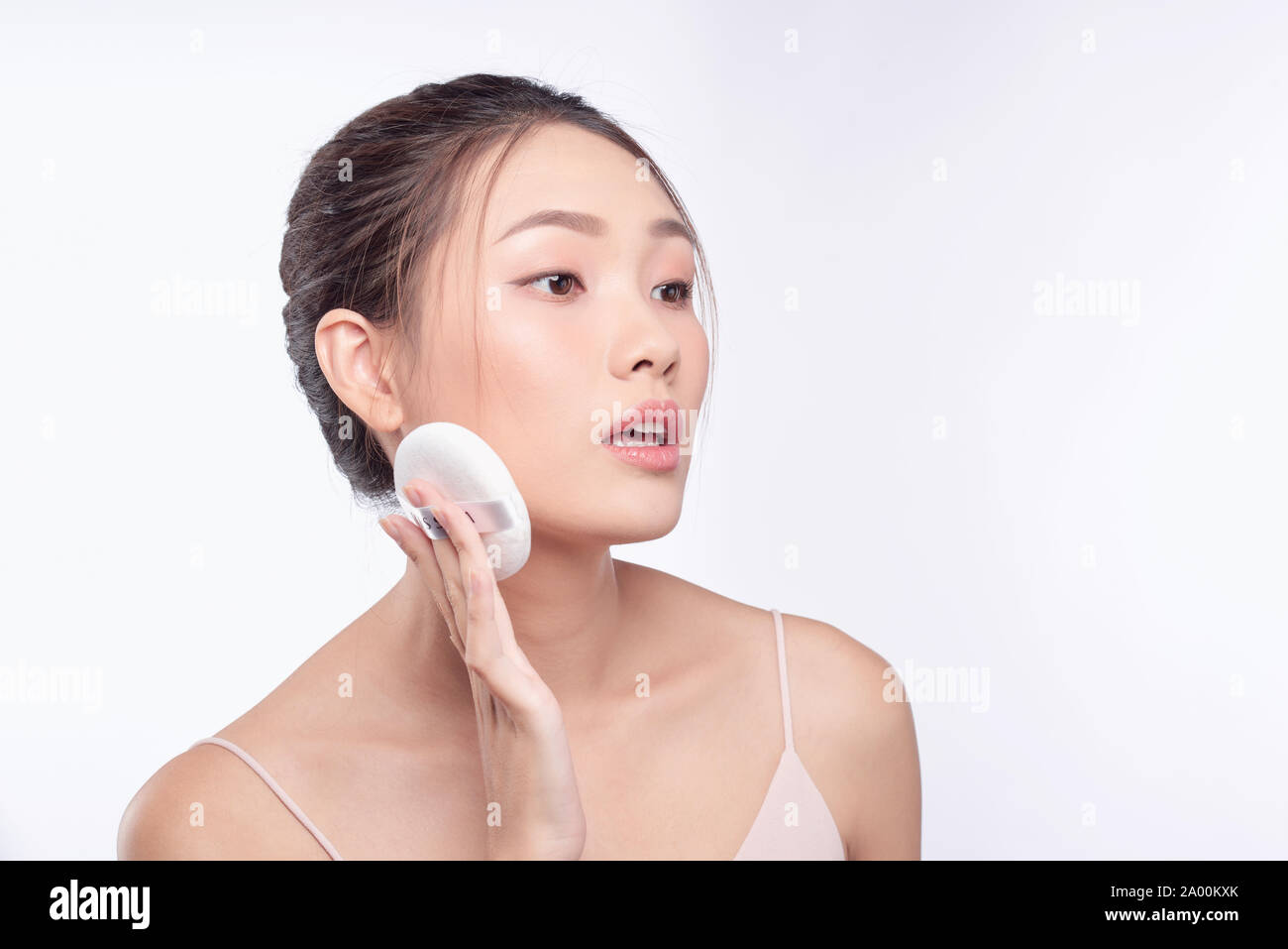 face of beauty young woman applying sponge - isolated on white Stock ...