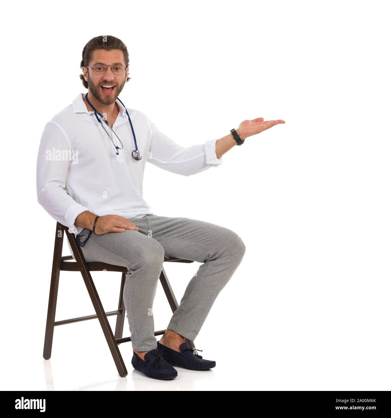 Doctor sitting on chair Cut Out Stock Images & Pictures - Alamy
