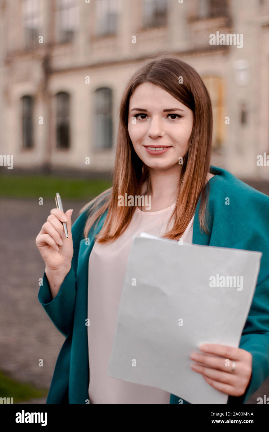 Woman pen documents hi-res stock photography and images - Alamy