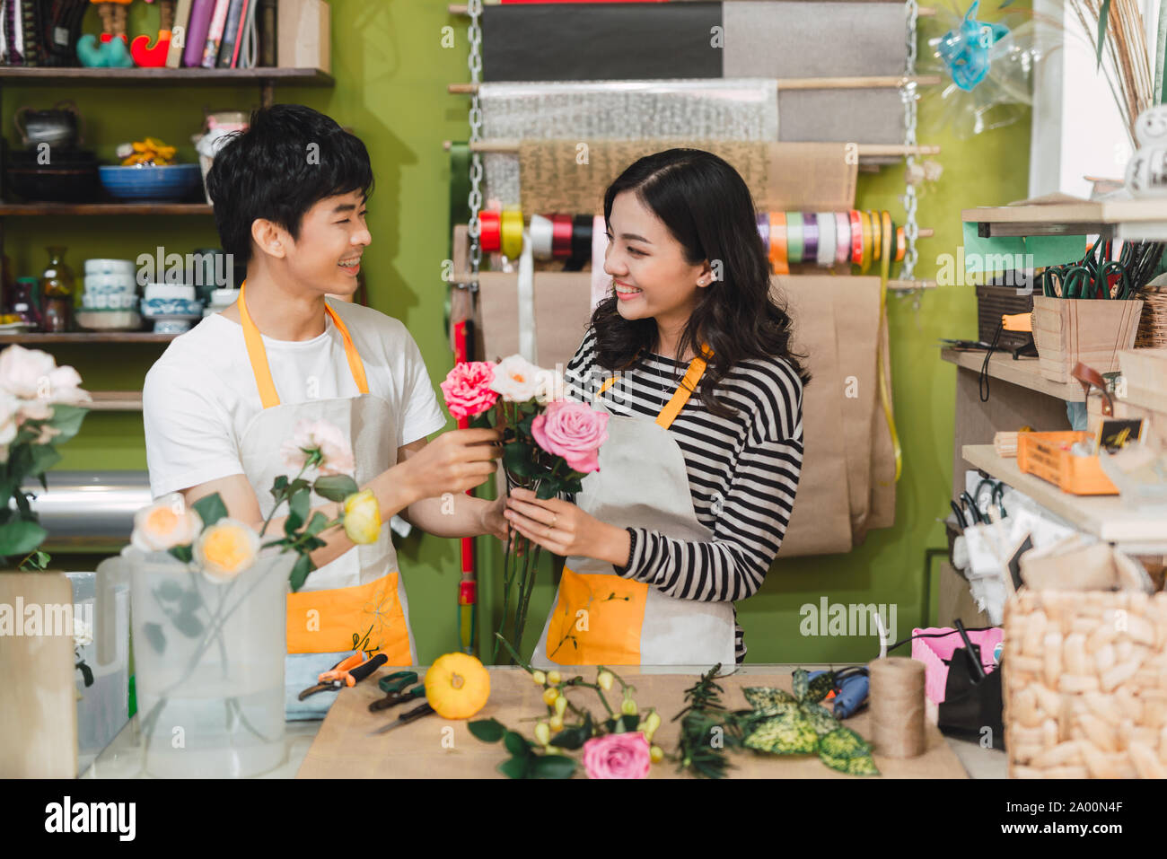Young couple making decorations hi-res stock photography and images - Alamy