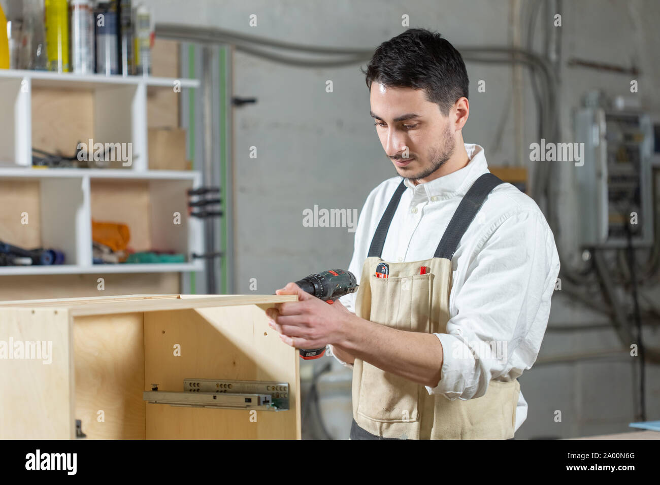 furniture factory, Small-Sized Companies and people concept - Young ...