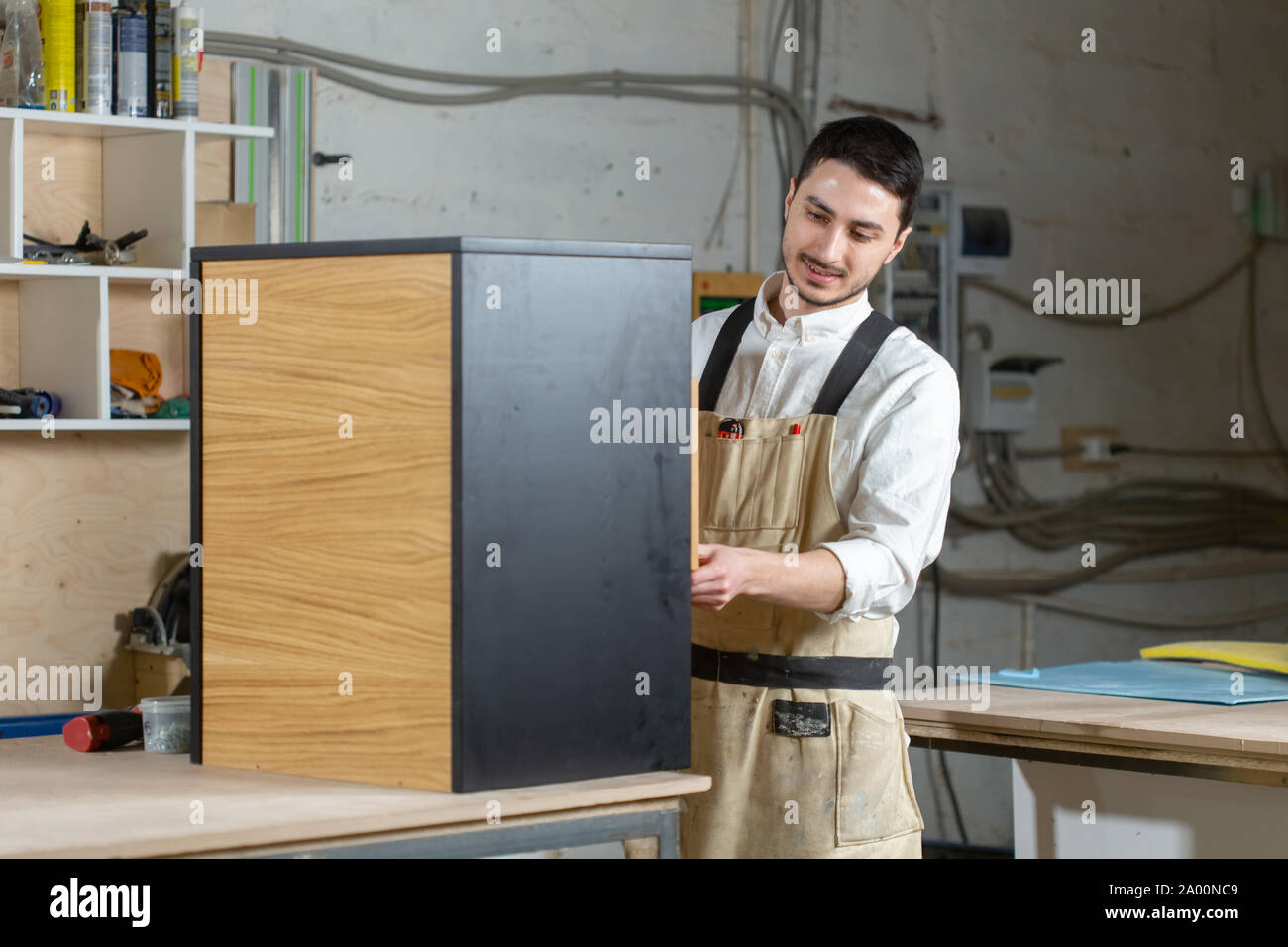 Furniture factory and small and medium sized enterprises concept - Man ...