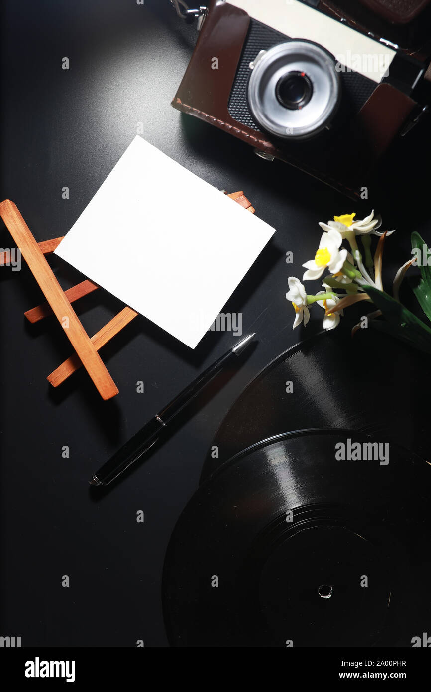 Vinyl plate and retro camera Stock Photo - Alamy