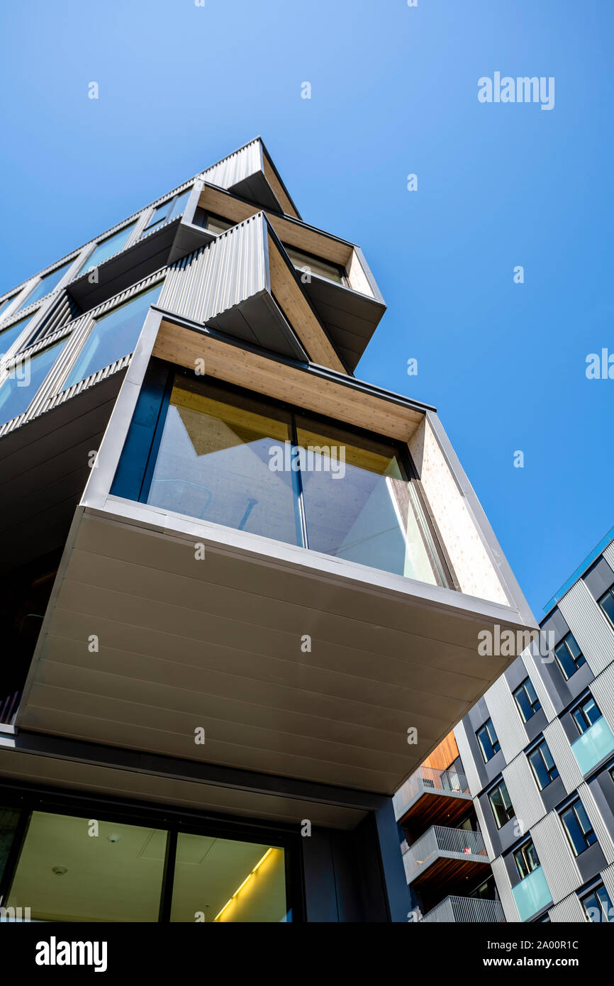 Street scene of the modern city with wall of a multistory apartment ...