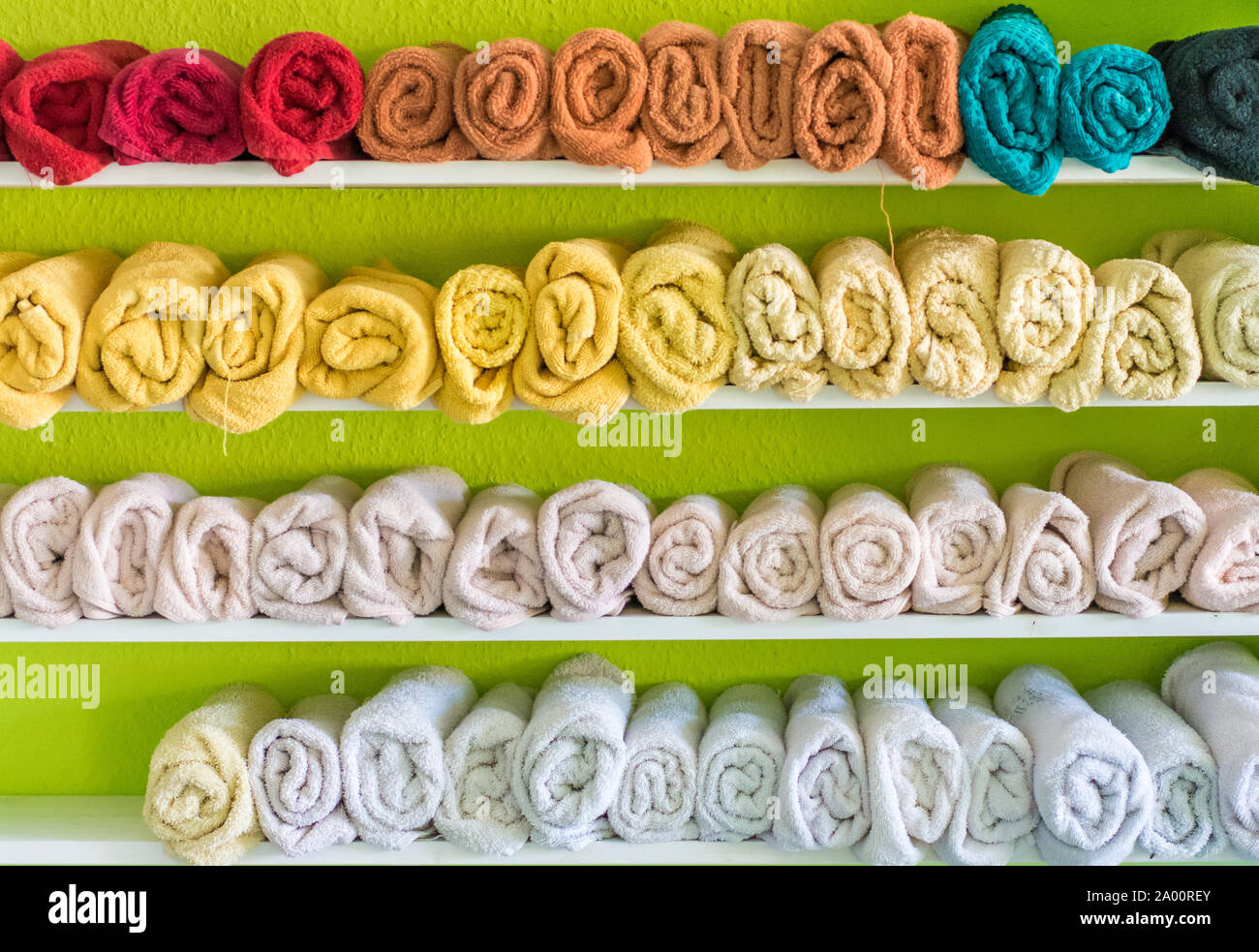 Different colored towels in the spa Stock Photo - Alamy