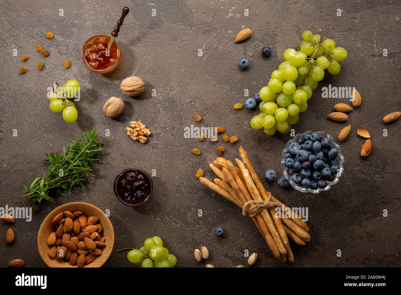 Healthy food background, fruits and nuts Stock Photo - Alamy