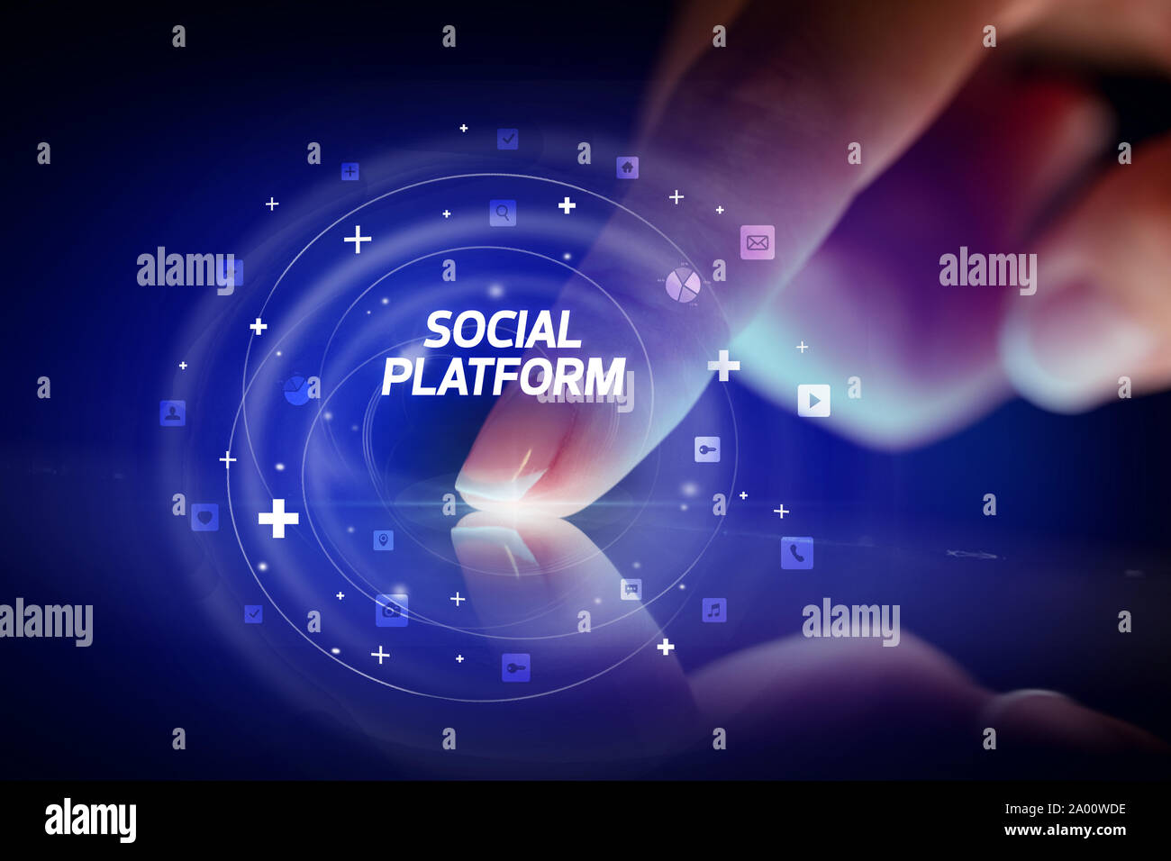 Finger touching tablet with social media icons and SOCIAL PLATFORM ...