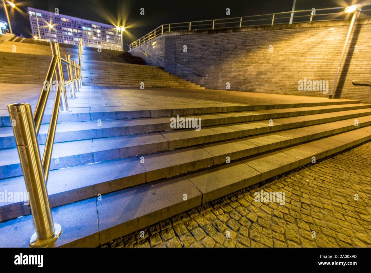 Stairs in a city at night Stock Photo - Alamy