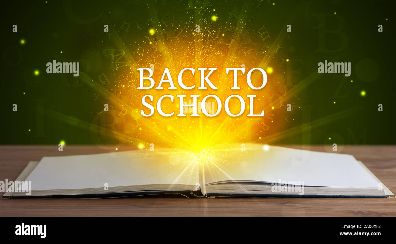 BACK TO SCHOOL inscription coming out from an open book, educational ...
