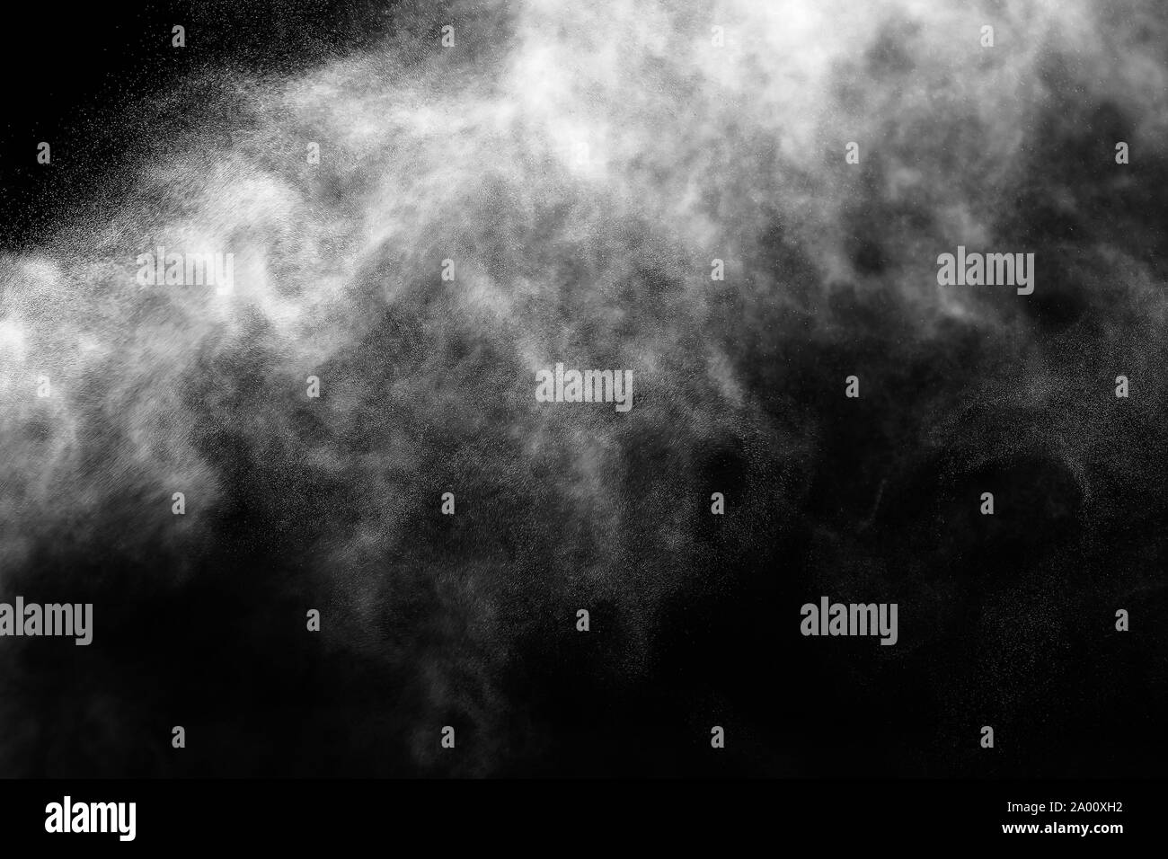 A stream of water and a cloud of drops Stock Photo - Alamy