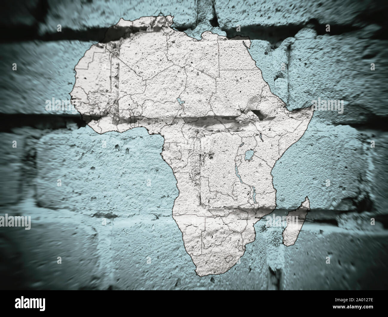 Africa map on background of brick, texture, blurred image Stock Photo ...