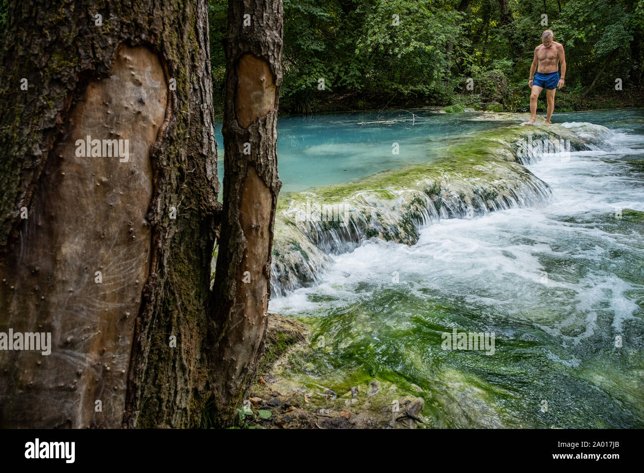 ELSA RIVER, ITALY - SEPTEMBER 15, 2019: one unknown man at Elsa river ...