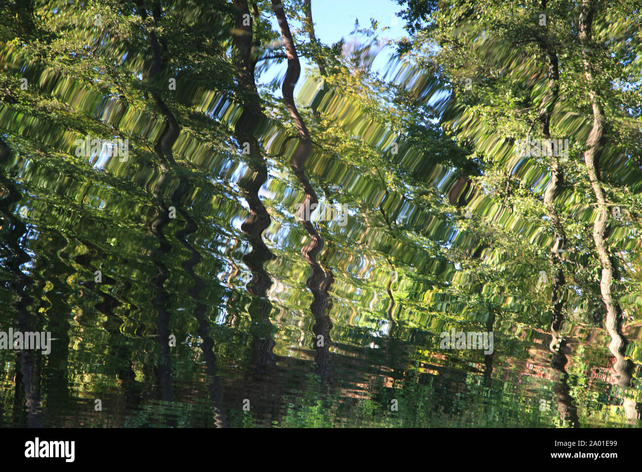 Reflection on the wavy pond water surface, texture, background Stock ...